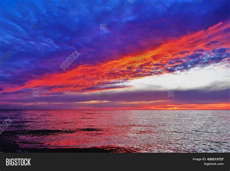 Bright Blazing Sunset Image And Photo Free Trial Bigstock