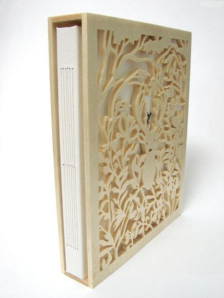 Intricately Carved Wooden Book With Bird And Flowers