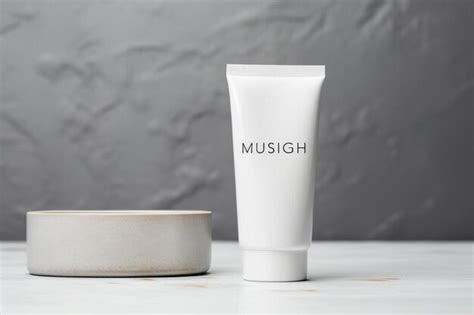 Premium Ai Image A White Container With A White Cap And A White Container Of Cream