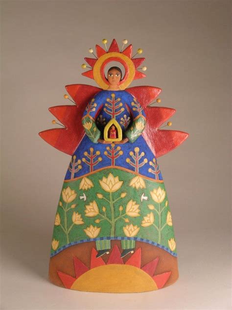 a colorful figurine sitting on top of a white surface