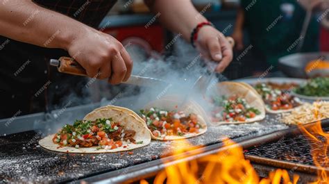 Premium Photo Chef Preparing Mexican Tacos At A Street Food Market