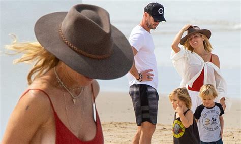 Elsa Pataky Reveals Side Boob In A Baywatch Inspired Swimsuit At The