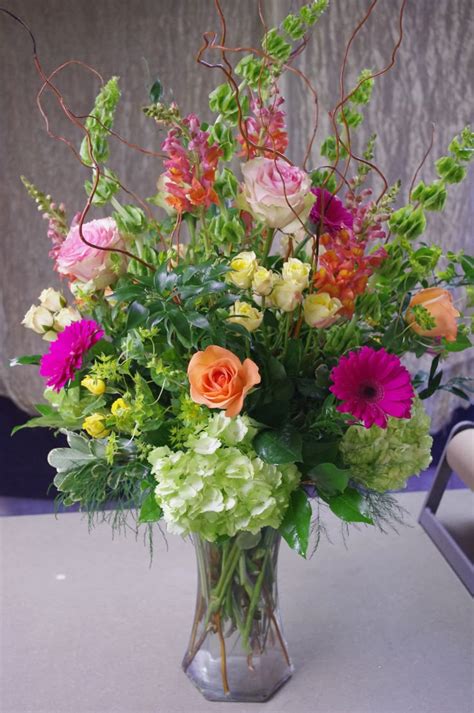 Tall Vase Arrangement Featuring Gerber Daisies Hydrangeas Long Stem