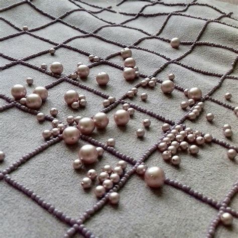 Some Beads Are Laying On The Fabric