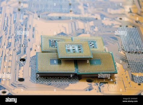 Many Computer CPU Close Up On The Motherboard Background Socket Of Central Process Unit