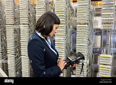 Technician Using Digital Cable Analyzer Stock Photo Alamy
