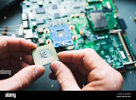 Analysis Installing Of Processor In CPU Socket Stock Photo Alamy