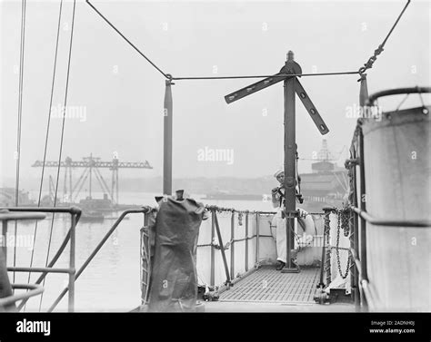 Naval Semaphore Signalling Sailor Operating A Semaphore Signalling Device On The Battleship Uss