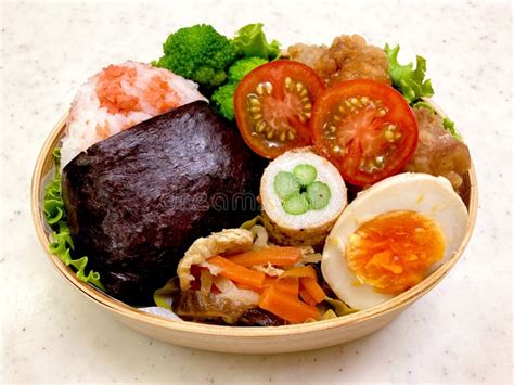 A Colorful Dosirak Lunchbox Filled With Neatly Arranged Rice Savory