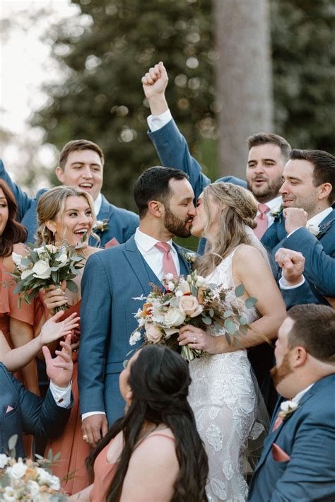 Navy Groomsmen Suits And Terracotta Bridesmaid Dresses Group Bridal