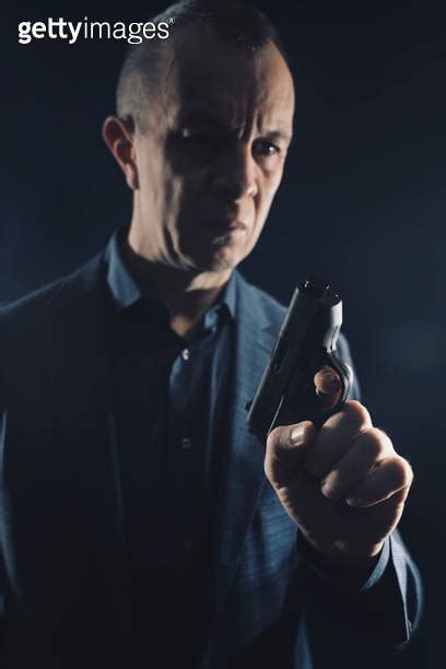 Assasin Spy Killer With Handgun Pistol 이미지 1776220401 게티이미지뱅크