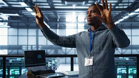 Computer Scientist Looking At Holograms In Data Center Using Ai Stock