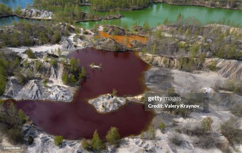 Colorful Lakes With Polluted Toxic Water In Abandoned Open Pit Mine Aerial View From Drone High