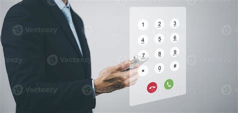 Dialing On Virtual Telephone Keypad With Transparent Telephone Buttons Businessman Touch