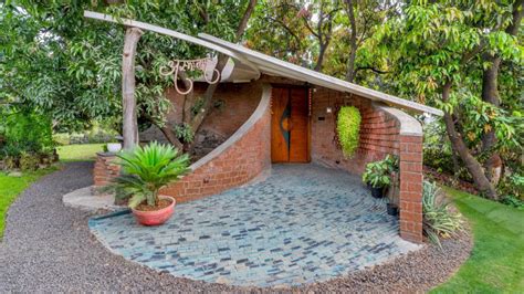 Blurring Boundaries Wraps Sculptural Home Around Tree In Indian Forest