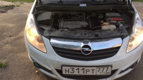 замена клеммы для лампы ближнего света, замена ламп Opel Corsa D 1,4 ...