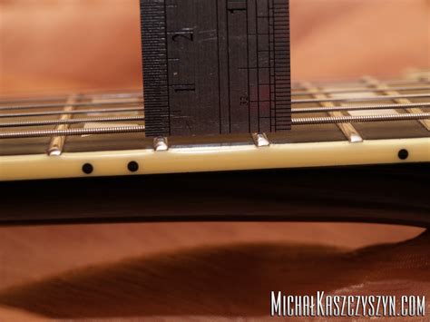 Michał String Action