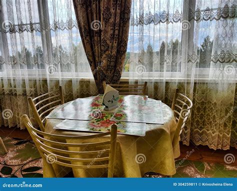 A Table In A Small Cozy Cafe Or Restaurant With A Window And Curtains Dimmed Lights Beautiful