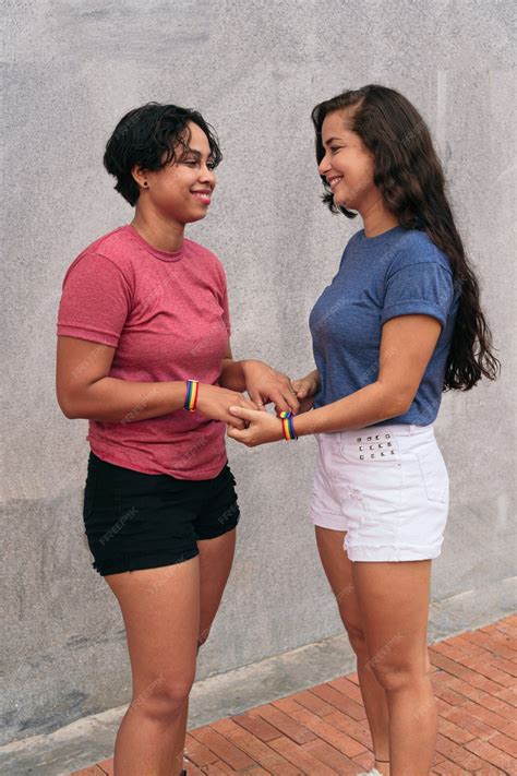 Premium Photo Latin Lesbian Couple Loving Each Other On The Street