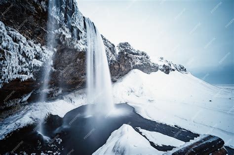 Premium Photo Iceland Seljalandsfoss Waterfall Winter In Iceland