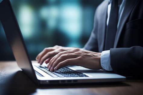 Premium Ai Image Business Man Typing On Laptop Keyboard