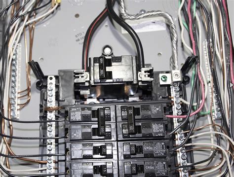 Inspecting The Main Electrical Panelboard During A Home Inspection InterNACHI