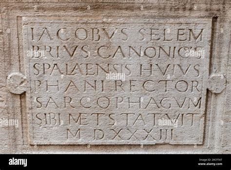 Latin Script On A Stone In A Wall In The Old Town Of Grad Split