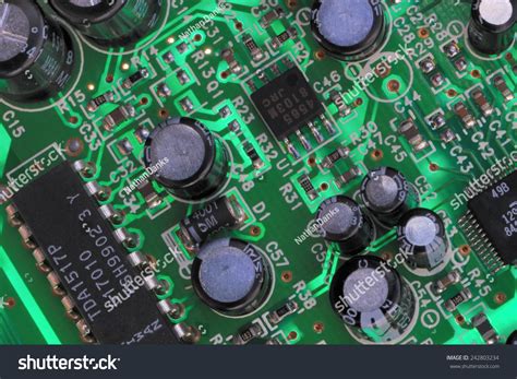Microchips And Live Circuit Board With Capacitors Electronic Circuitry