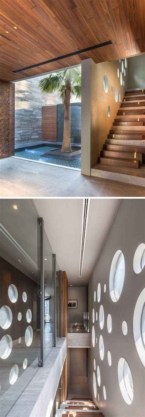 Modern Villa With Large Sliding Glass Doors And Pool View