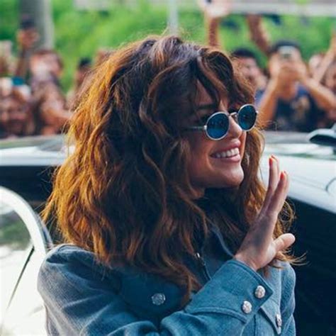 Selena Gomez Haircuts With Side Bangs