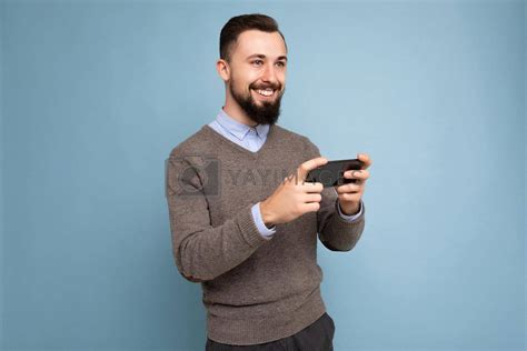 Shot Of Happy Handsome Babe Brunette Unshaven Man With Beard Wearing Everyday Grey Sweater And