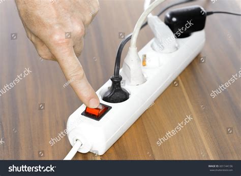 Finger Switching Off Electrical Multiple Socket Stock Photo 601144136 Shutterstock
