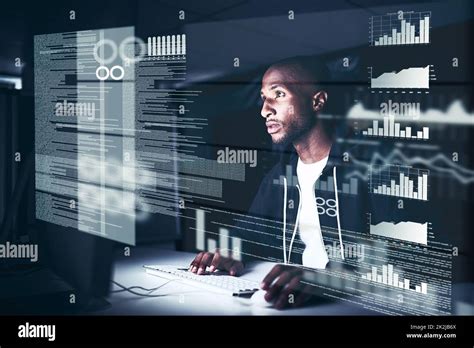 Fixing A Bug Cropped Shot Of A Young Male Hacker Cracking A Computer