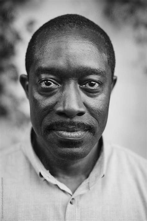 Serious But Hopeful Stare From A Mature Man By Stocksy Contributor Rob And Julia Campbell
