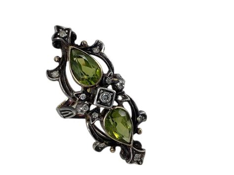 Lot Splendid Peridot And Diamond Ring In Gold And Silver With A