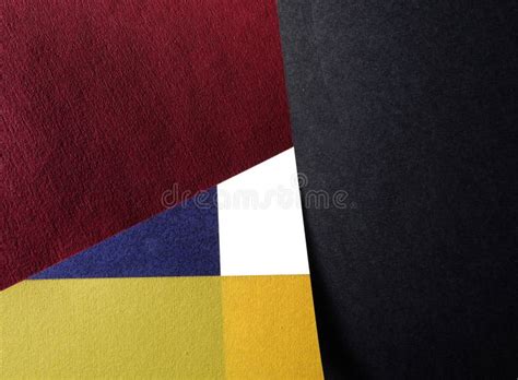 Textured Construction Paper Overlapping Red Yellow And Blue Colors With Black And White Stock
