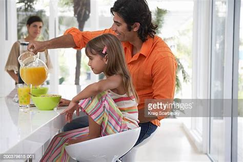 701 Man Pouring Cereal Stock Photos, High-Res Pictures, and Images ...