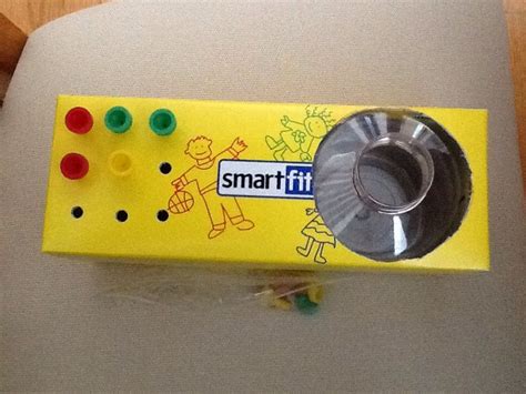 Using Pincer Grasp To Pull Game Pieces Out Of Box And Put Into The