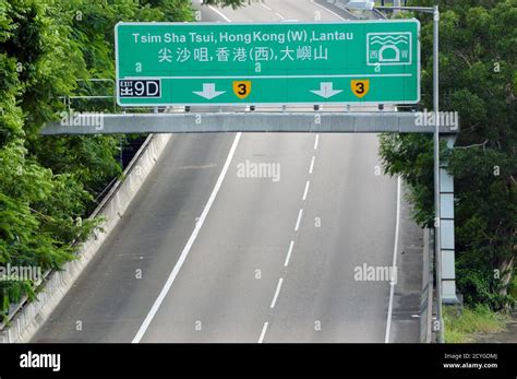 Green Road Sign On A Hong Kong Highway Tsuen Wan Road Exit 9d Stock