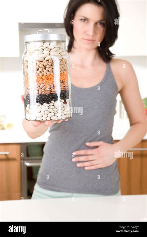 Woman With Different Varieties Of Beans Stock Photo Alamy