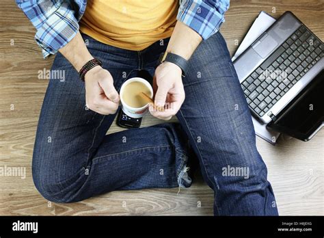 Man On The Floor With A Laptop Stock Photo Alamy