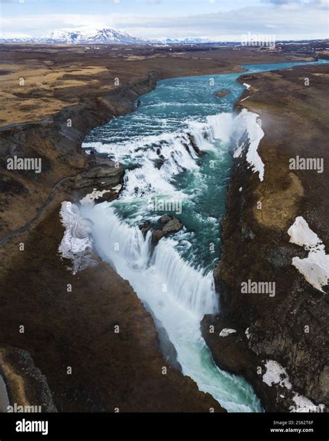 Aerial View Of Gullfoss Waterfall Cascading Through A Canyon In South