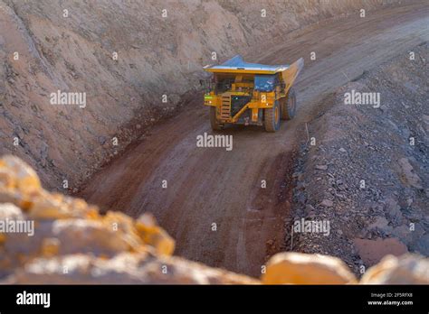 Dump Truck At Open Pit Mine Transporting Ore On Haul Road Stock Photo Alamy