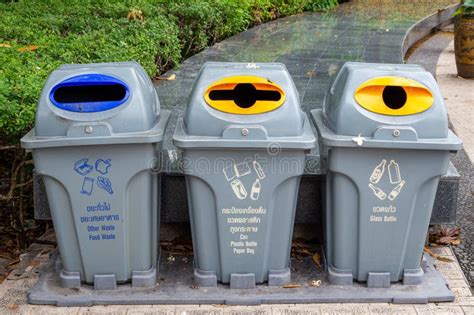 Three Waste Containers With Waste Separation By Type In A City Park