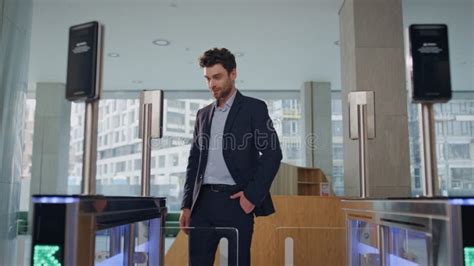 Confident Businessman Passing Electronic Gates With Face Recognition System Stock Video Video
