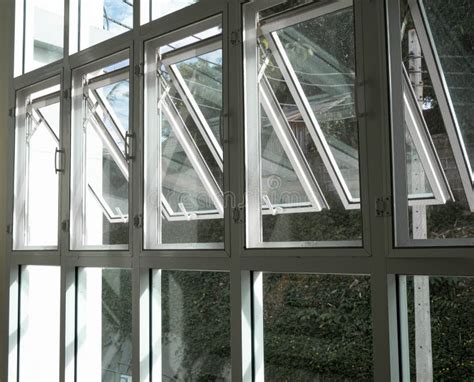 Open A Modern Style Windows With Sunlight Background Stock Image