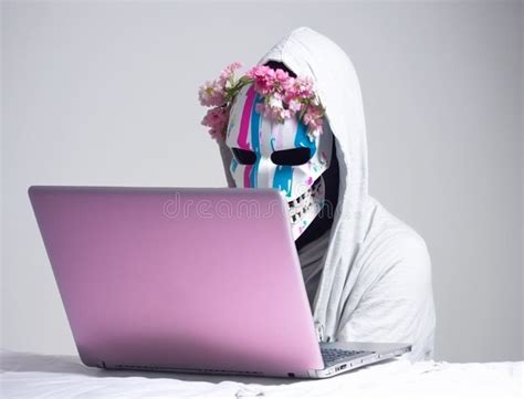 Anonymous Hacker With Crazy And Weird Fashion Concept Of Hacking Cybersecurity Cybercrime