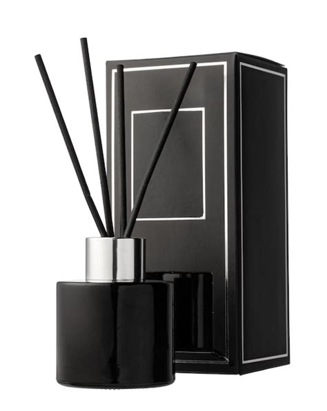 Premium Photo Aromatic Diffuser Bottle With Sticks Isolated On White Background