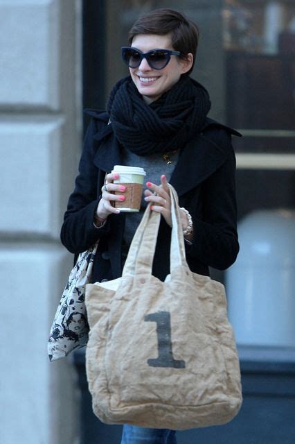 Anne Hathaway Grabs Coffee In Nyc With Different Nail Polish Nail