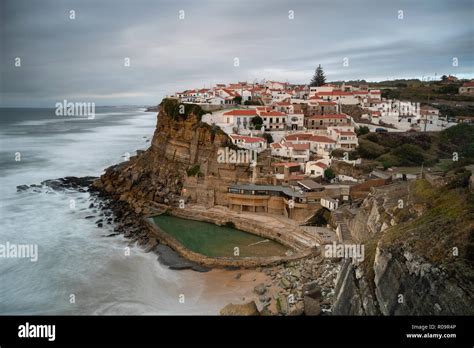 View Of The Picturesque Village Azenhas Do Mar On The Edge Of A Cliff